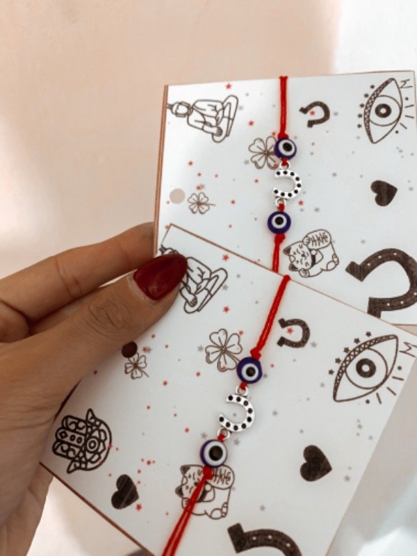 Pulsera herradura y ojo (x unidad) - Reffiné accesorios